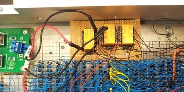 A Unique ATE Test Fixture for Performing In-Circuit and Functional Tests